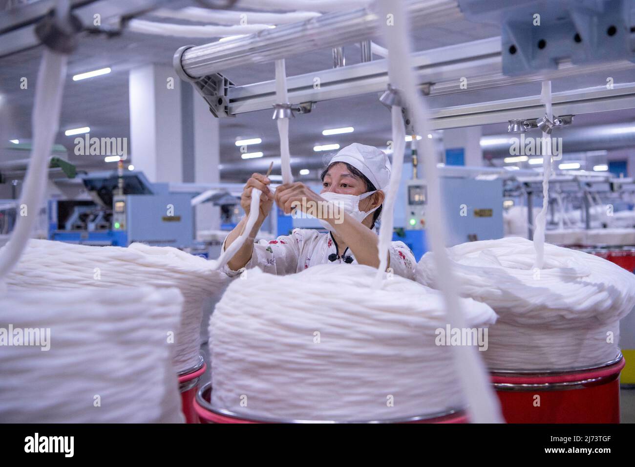 NANTONG, CHINA - MAY 6, 2022 - A worker works on a production line at a ...
