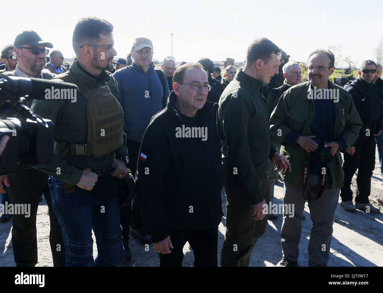 Poland's Minister of Interior and Administration Mariusz Kaminski (C ...