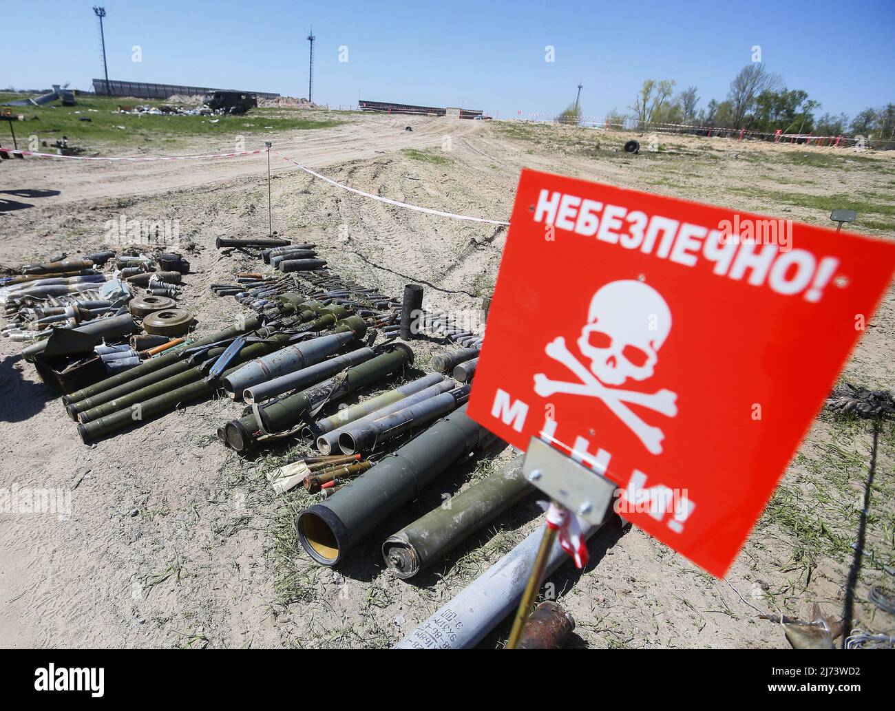 A warning sign reading Danger! Mines! is seen after the battles with ...
