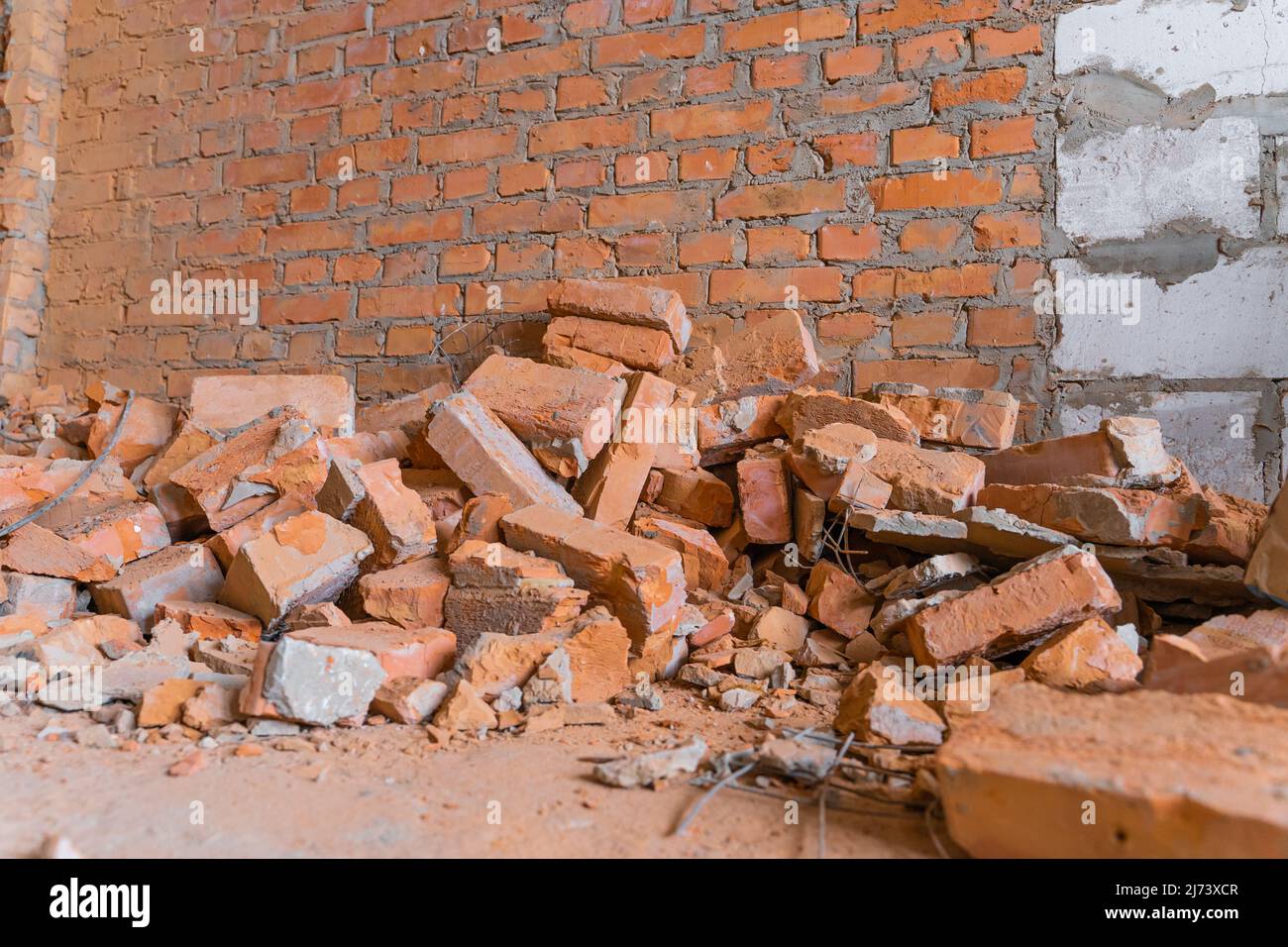 Construction industry waste. Red brick trash Stock Photo - Alamy