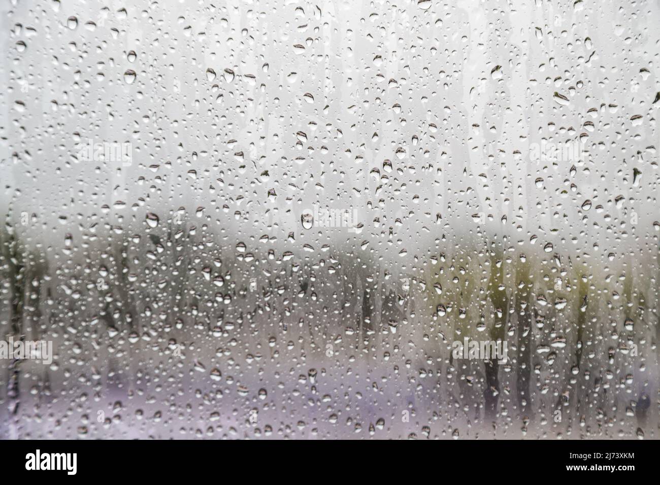 Water drop on glass windows background Stock Photo - Alamy