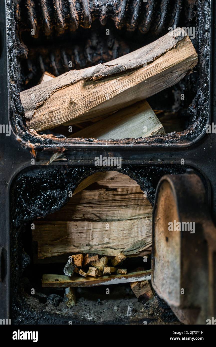 Solid fuel boiler for heating on wood is completely filled with wood ...