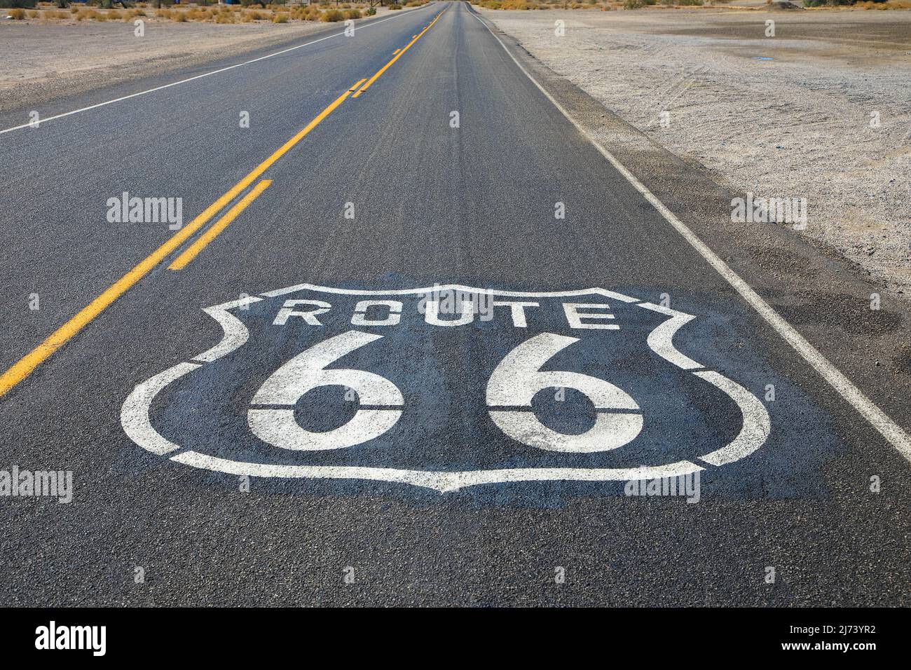 Highway sign for historic Route 66 on asphalt of country road. Mojave ...