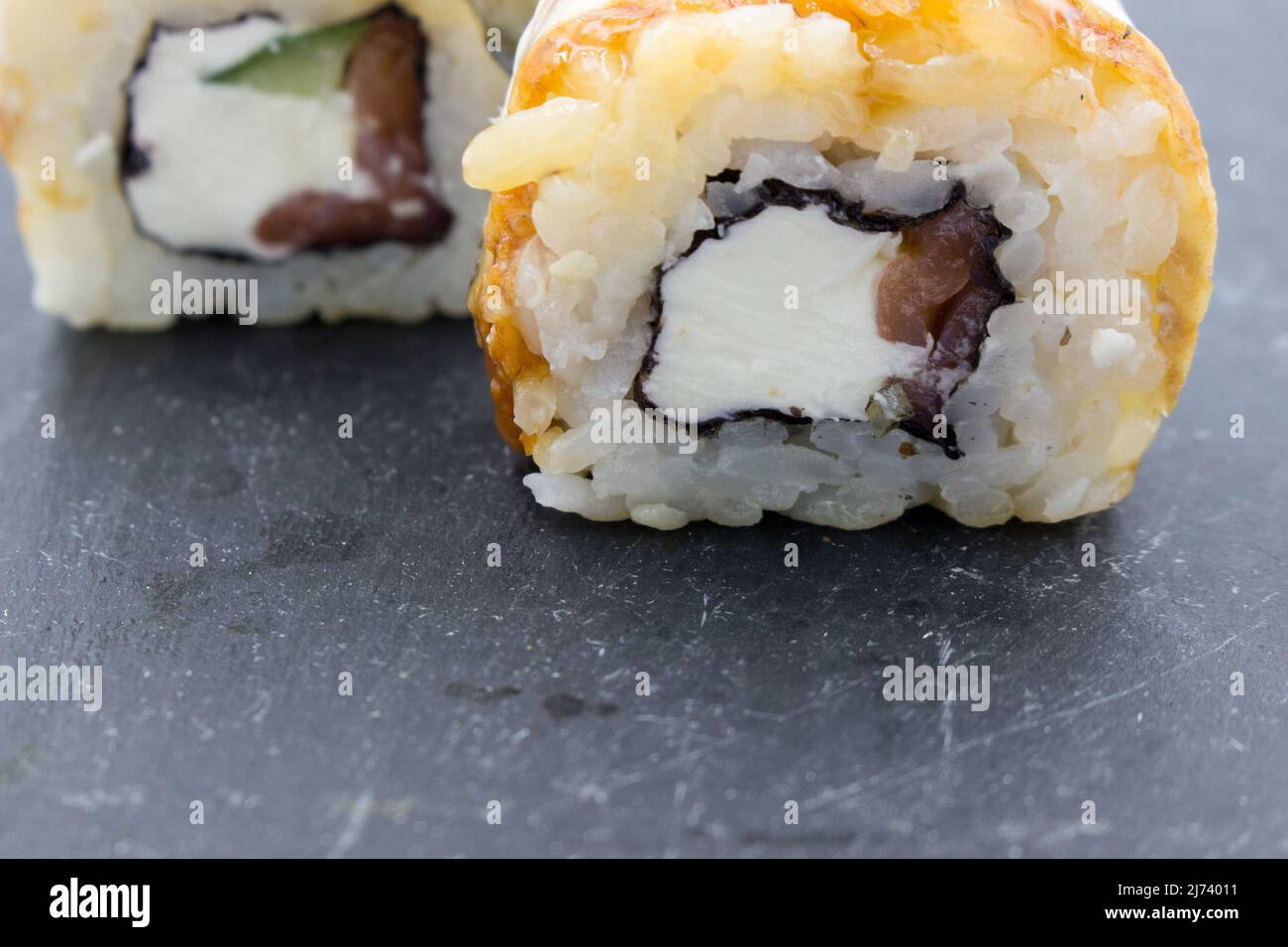 Roll fried eel fillet, slightly salted trout, fresh cucumber, curd ...