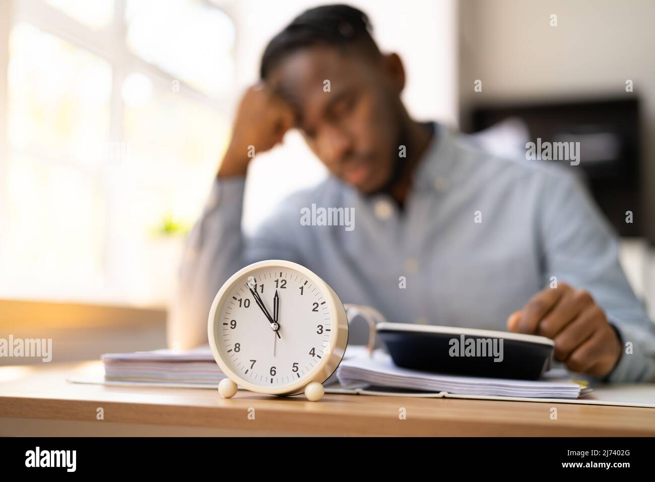 Accountant Calculating Bill With Time Clock. Money Alarm Stock Photo ...
