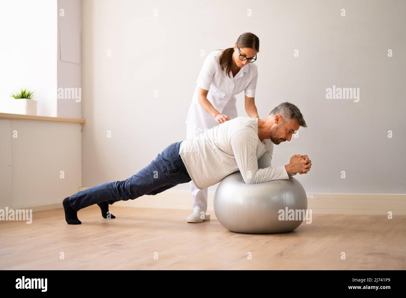 Physical Physiotherapy And Rehabilitation. Professional Therapist ...