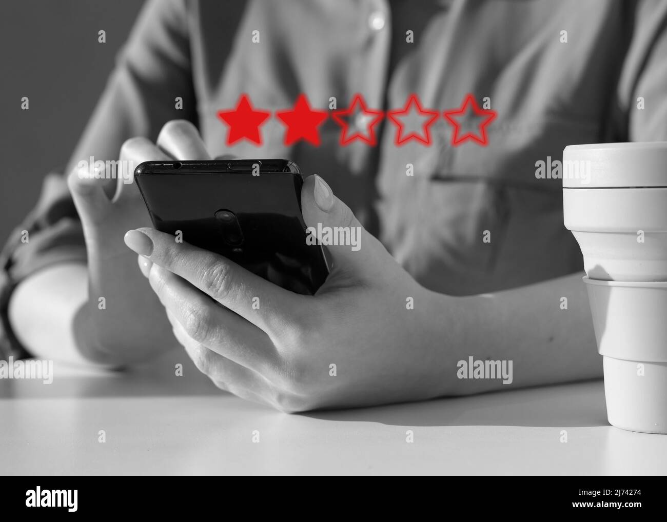 Two star rating. Woman giving negative feedback in phone. Evaluation of ...