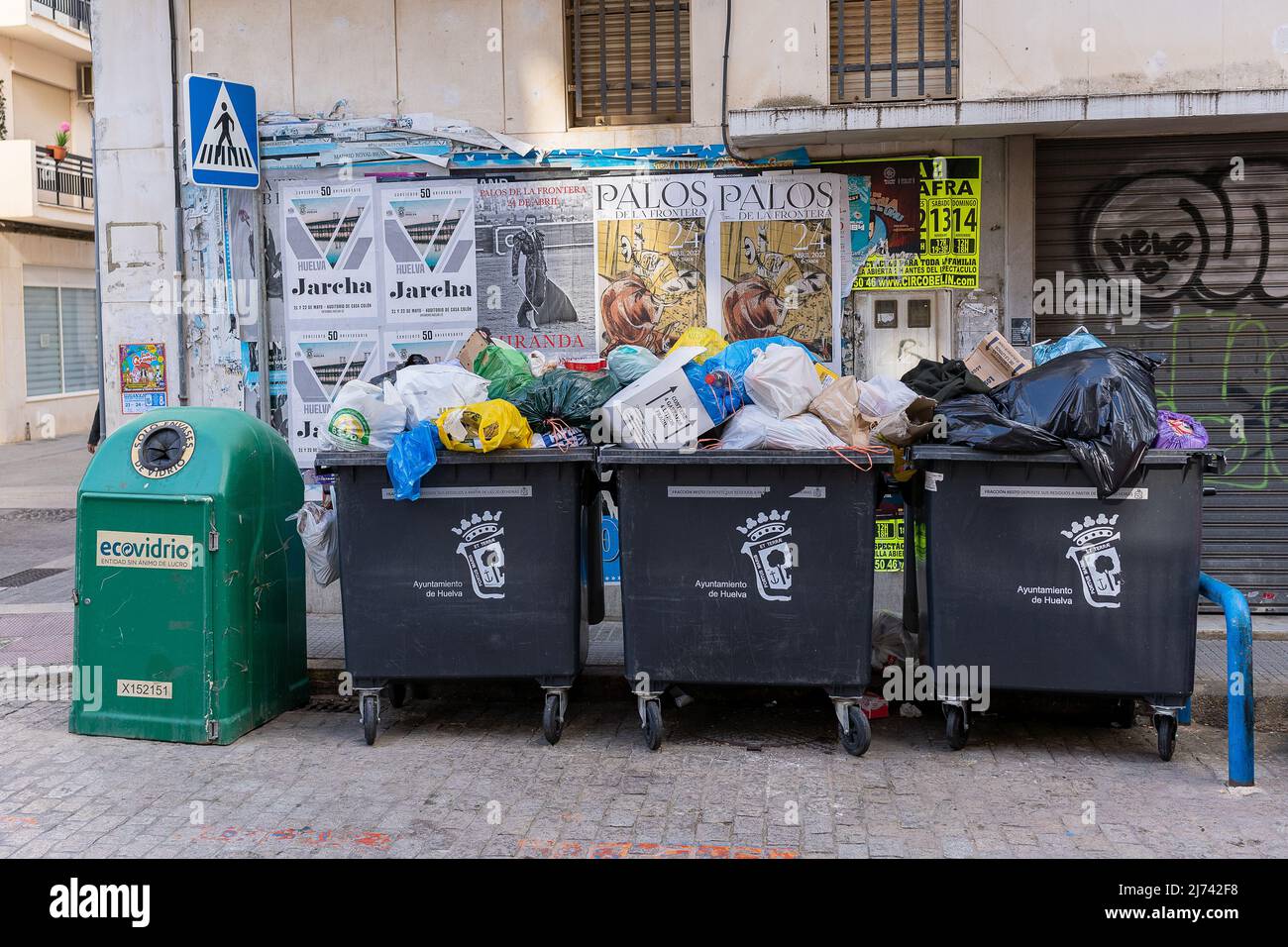 HUELVA, SPAIN - APRIL 19, 2022: Garbage bins full of waste Stock Photo ...