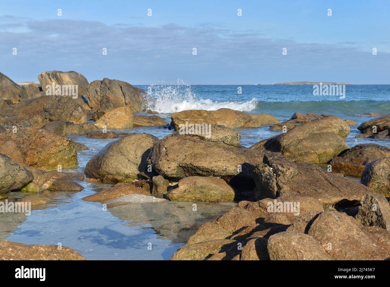 rocks in the sea and wave background on a Brittany beach -France Stock ...