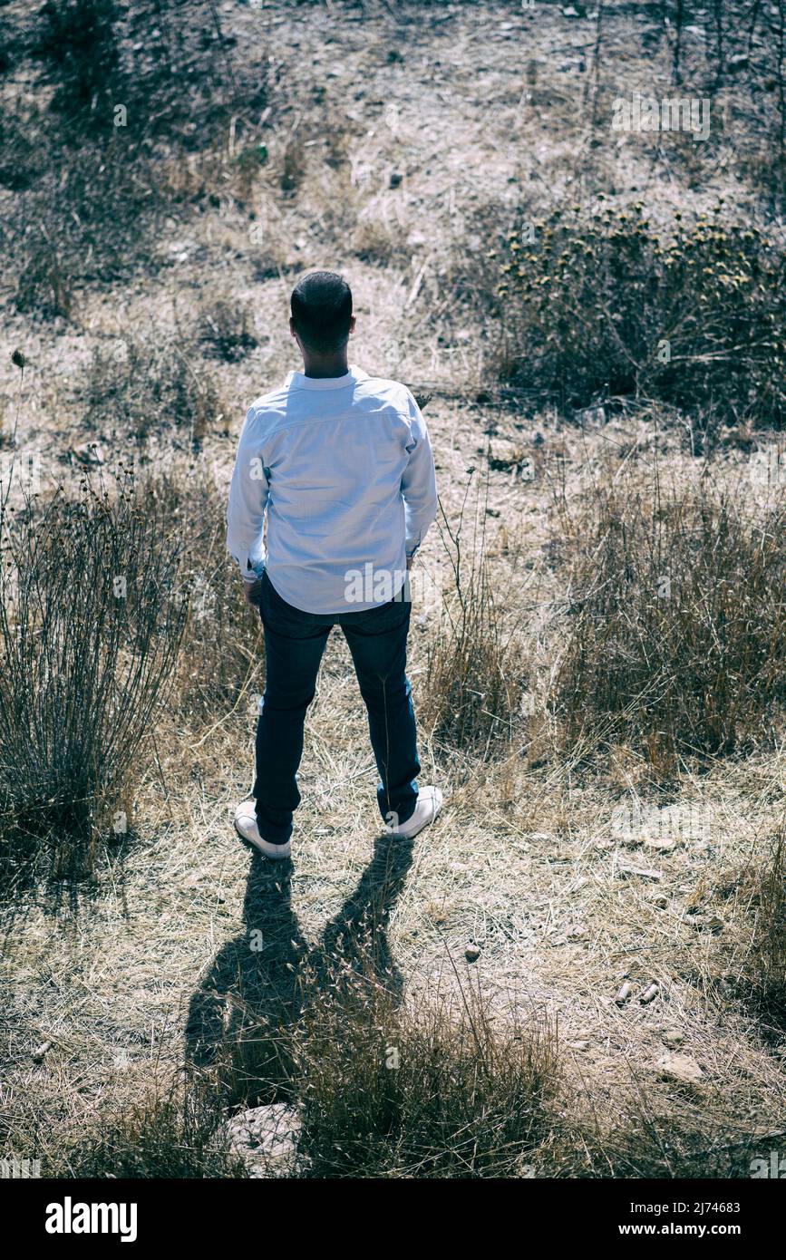 High angle view of man and woman standing in the field Stock Photo - Alamy