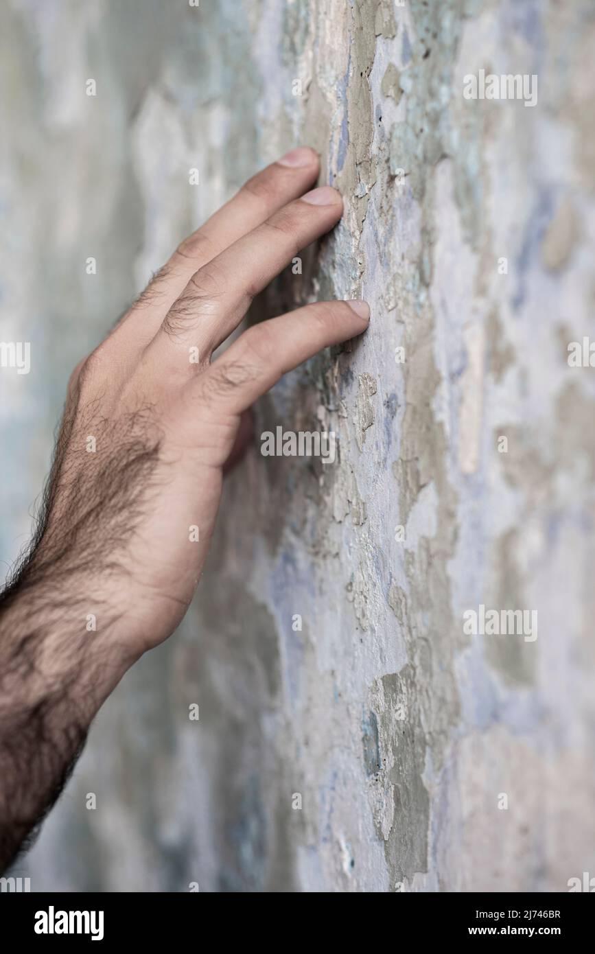 Touching the wall hi-res stock photography and images - Alamy
