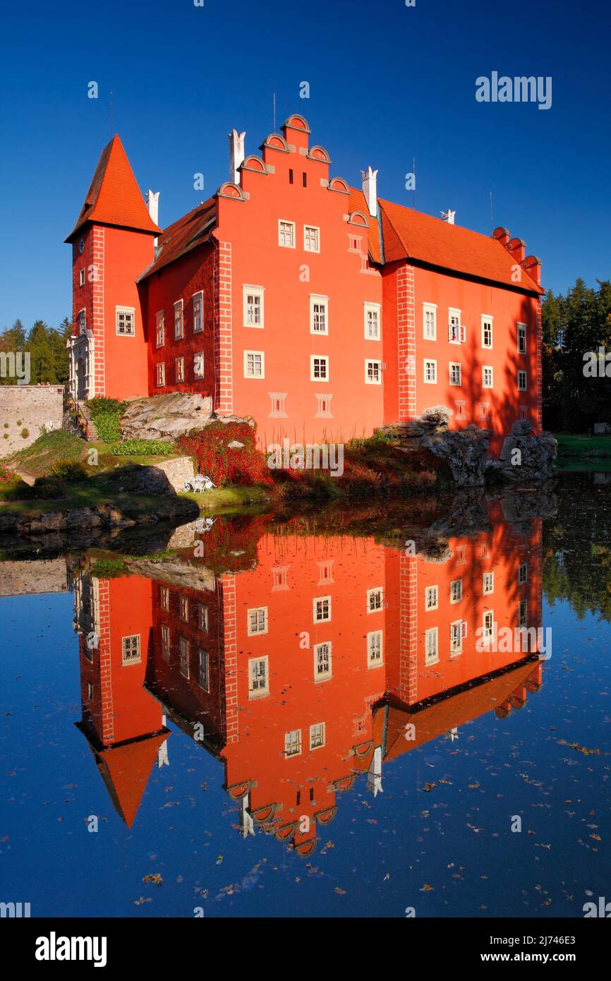 Reflection of the red castle on the lake, with dark blue sky, state ...