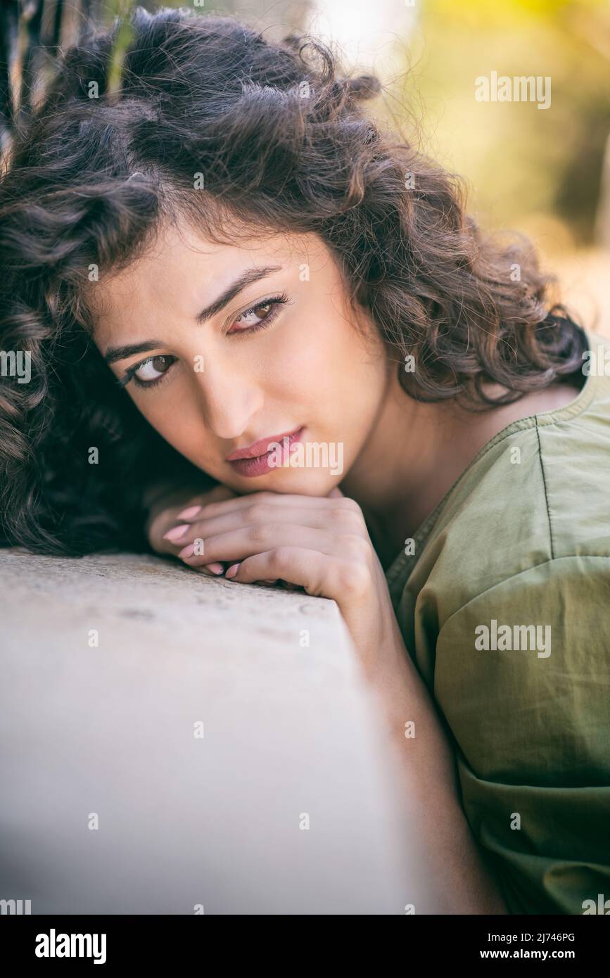 Woman looking away outdoors Stock Photo - Alamy