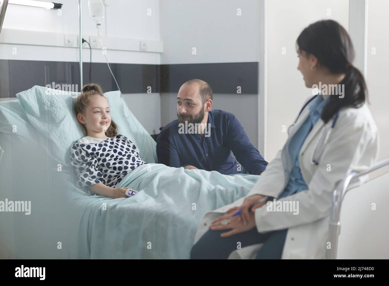 Pediatric clinic medic specialist explaining to stressed uneasy man ...