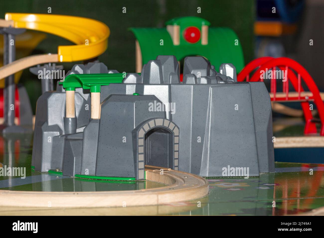 Toy train road with rock way Stock Photo - Alamy