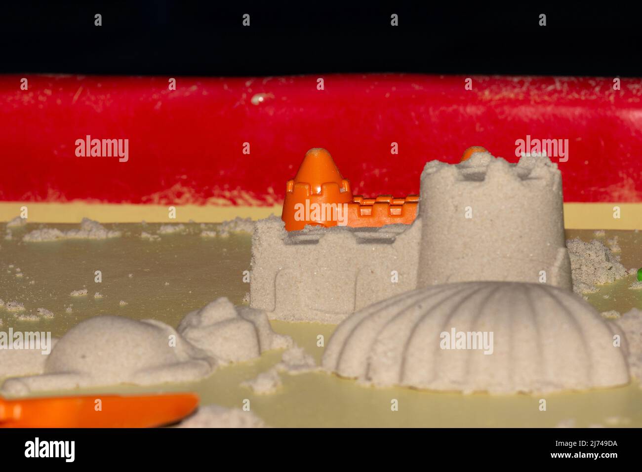 Kinetic sand on playground Stock Photo - Alamy