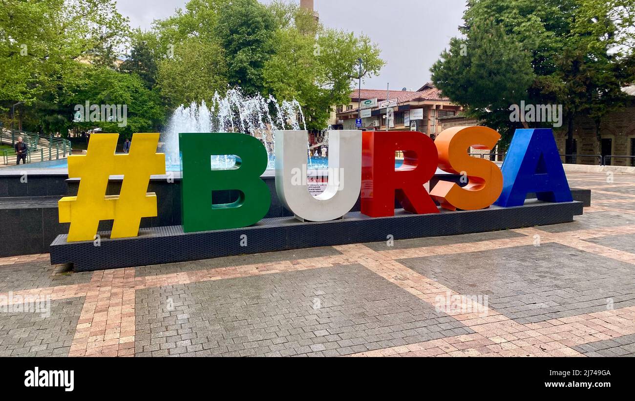 Bursa city name sculpture in front of koza han and Ulu camii Stock ...
