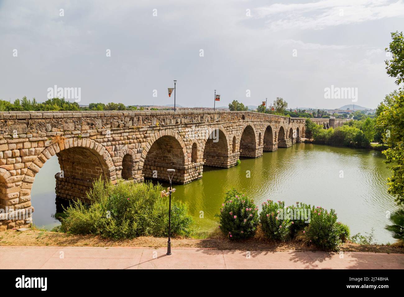 Merida, Spain - September 13, 2021. The Puente Romano, an old bridge ...
