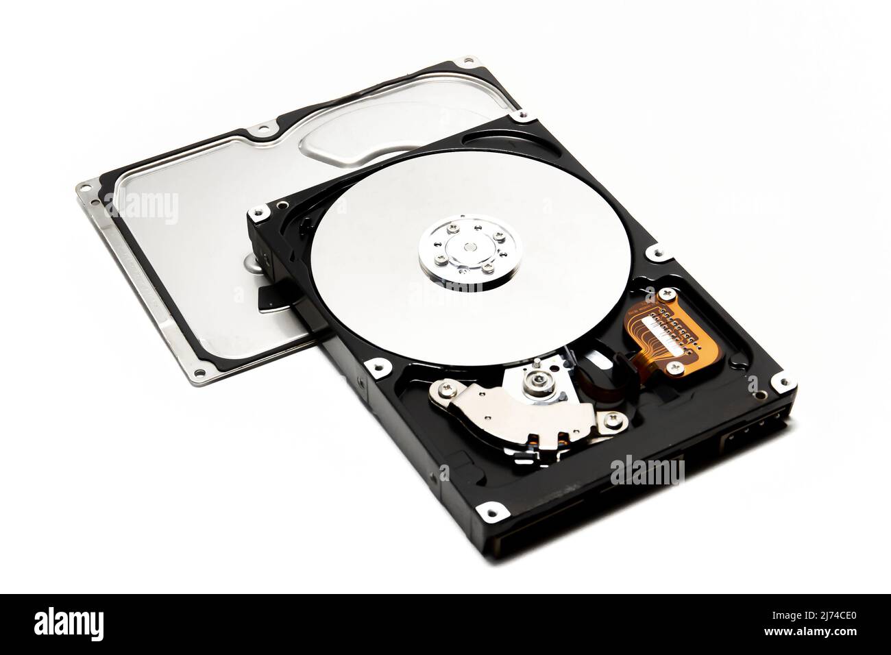 Open hard drive isolated on white background. Computer storage device ...
