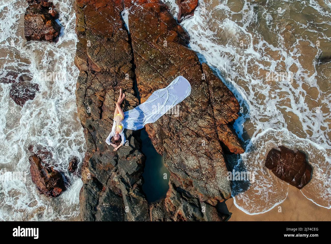 Woman lying on back in sea hi-res stock photography and images - Alamy