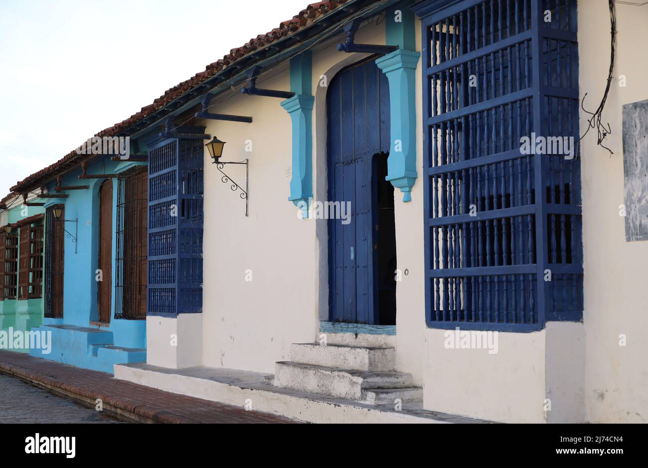 Entrance to an ancient house in the city of Camaguey, Cuba Stock Photo ...