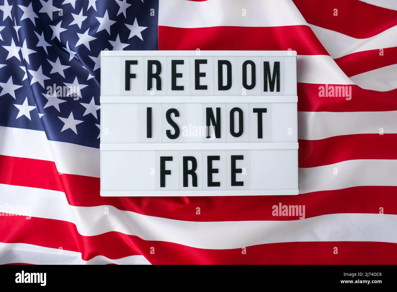 American flag. Lightbox with text FREEDOM IS NOT FREE Flag of the ...