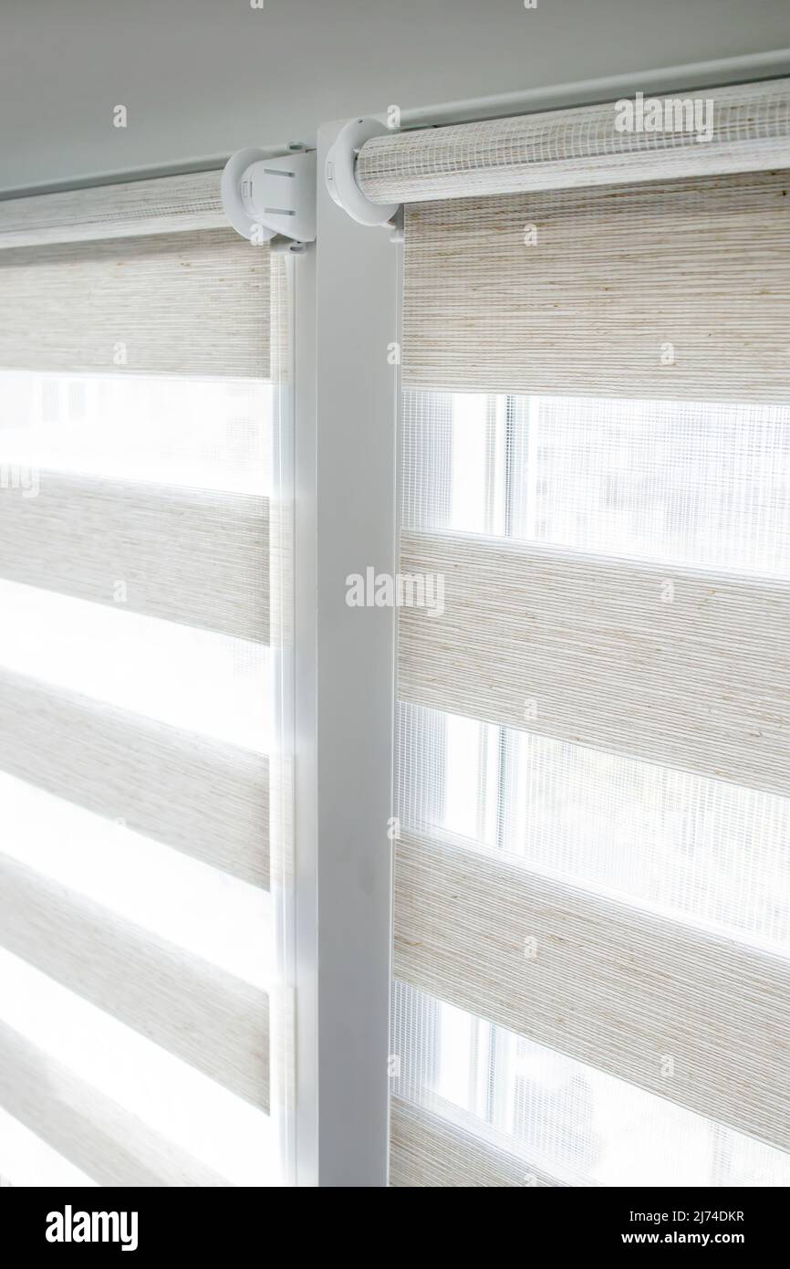 Window roller duo system day and night. Close up on roll curtains ...