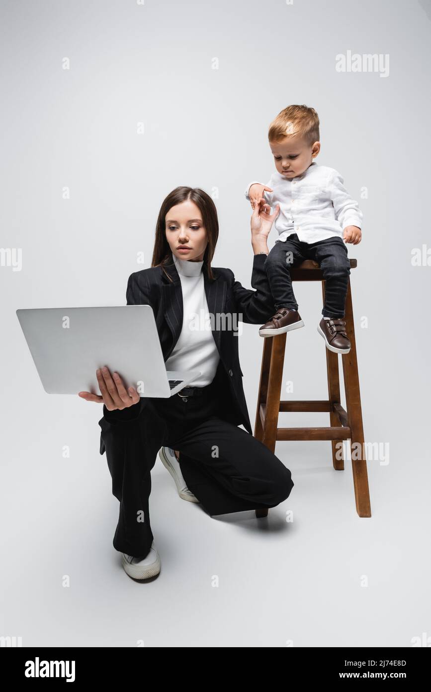 Hands holding stool hi-res stock photography and images - Alamy