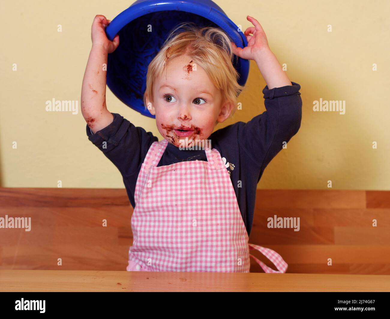 Licking chocolate biscuit hi-res stock photography and images - Alamy