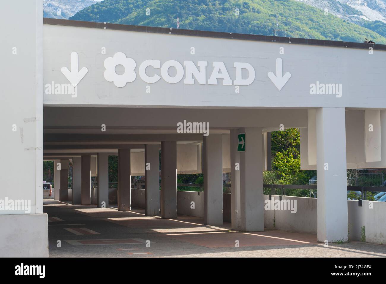 Carrara, Italy - May 6, 2022 - Entrance and sign of a Conad supermarket ...
