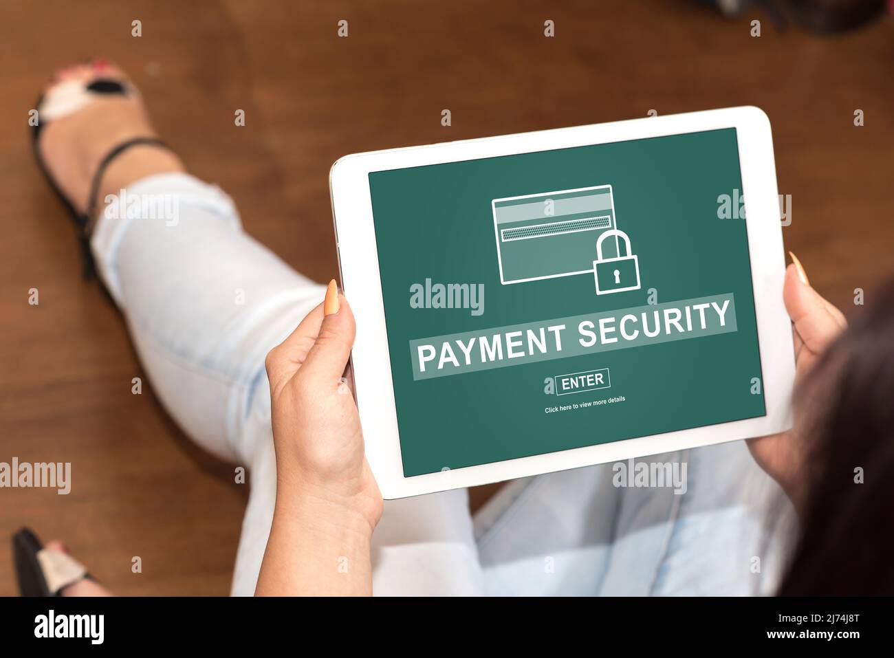 Tablet screen displaying a payment security concept Stock Photo - Alamy