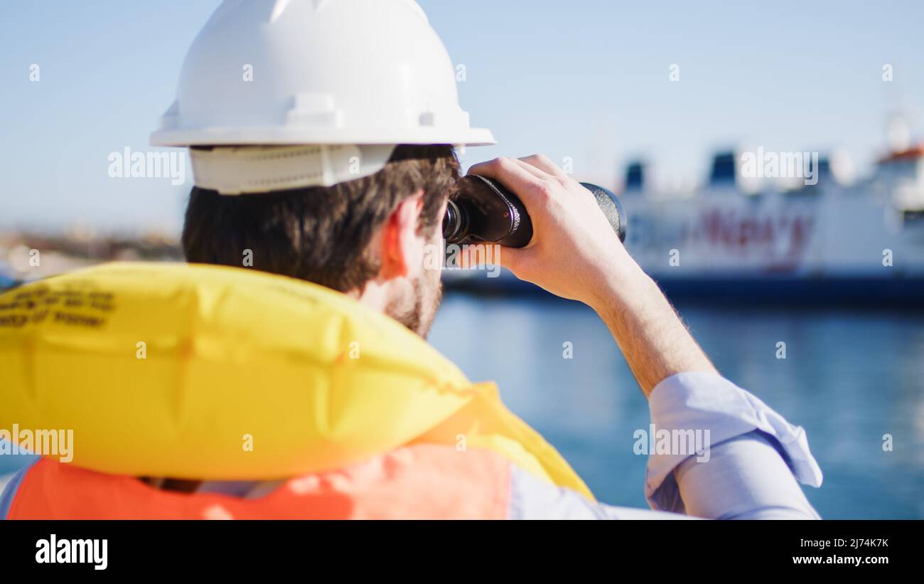 Engineer wearing white helmet close up Stock Photo - Alamy