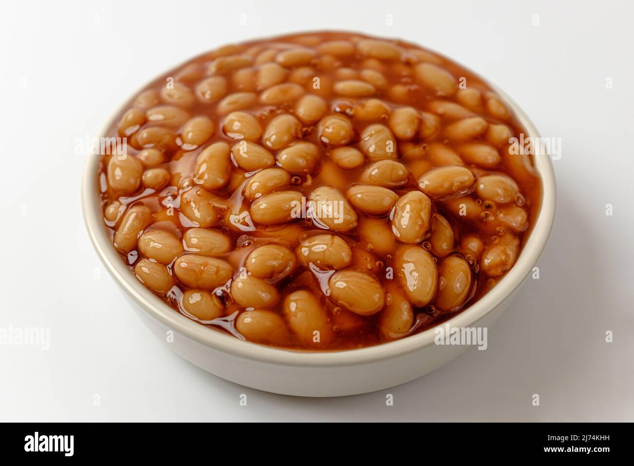 baked beans on a white background Stock Photo - Alamy