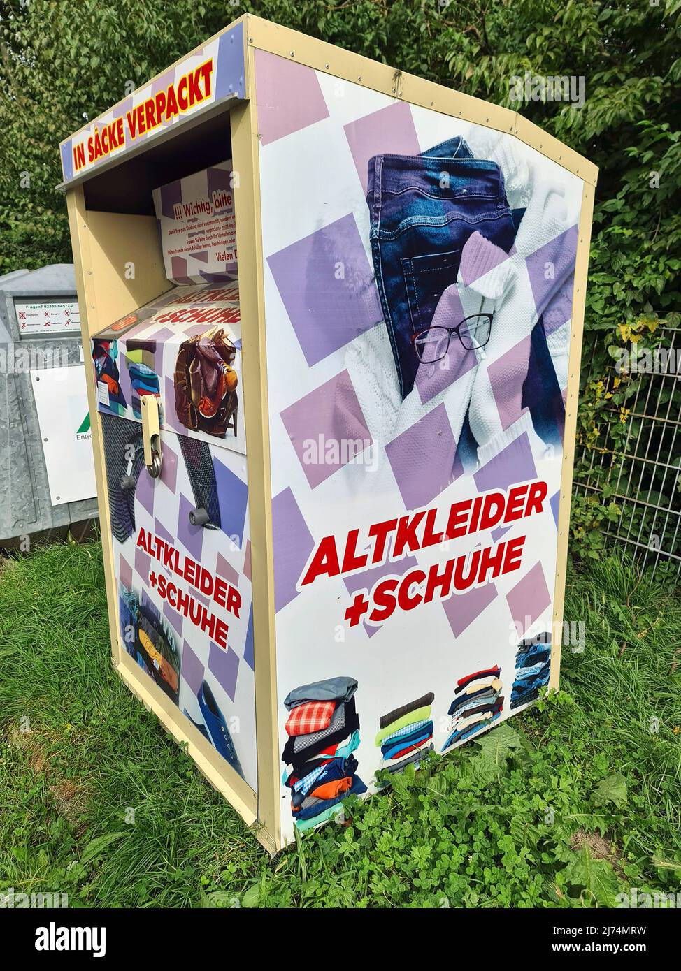 Old clothes collection container hi-res stock photography and images ...