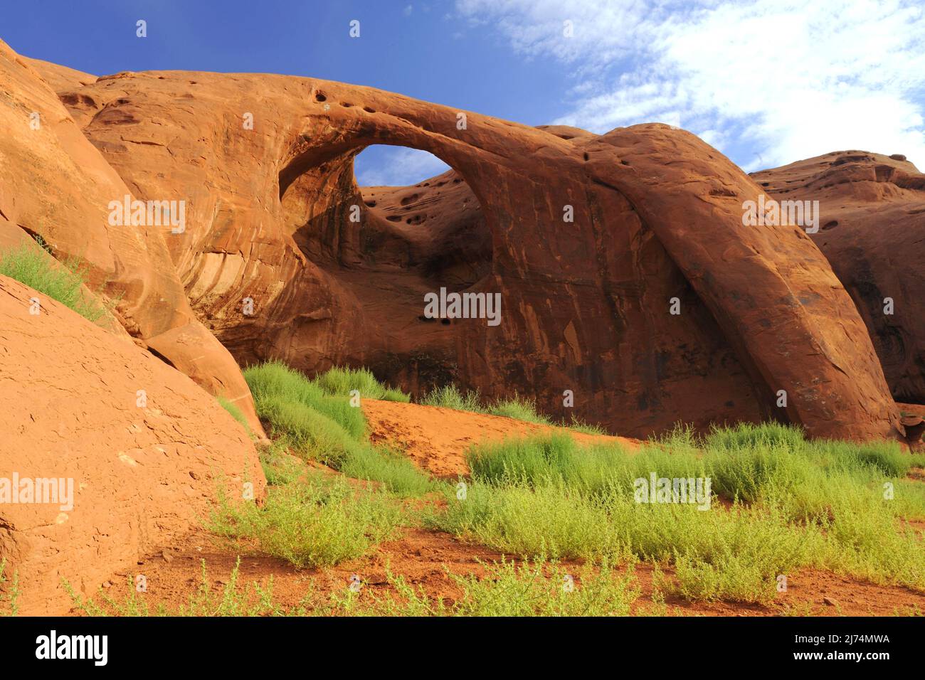 Natural arch monument valley arizona hi-res stock photography and ...