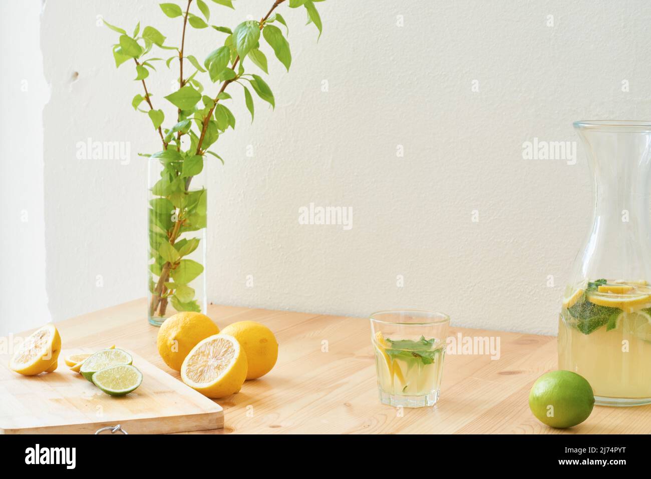 Homemade lemon drink on table minimal background Stock Photo - Alamy