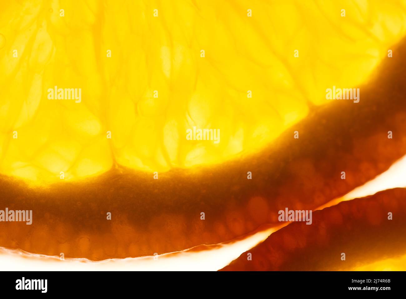 Orange slice close up vibrant background copy space Stock Photo - Alamy Orange slice close up vibrant background copy space Stock Photo - Alamy
