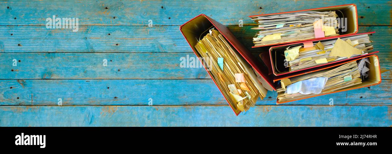 Messy file folders,red tape,flat lay, bureaucracy,aministration ...