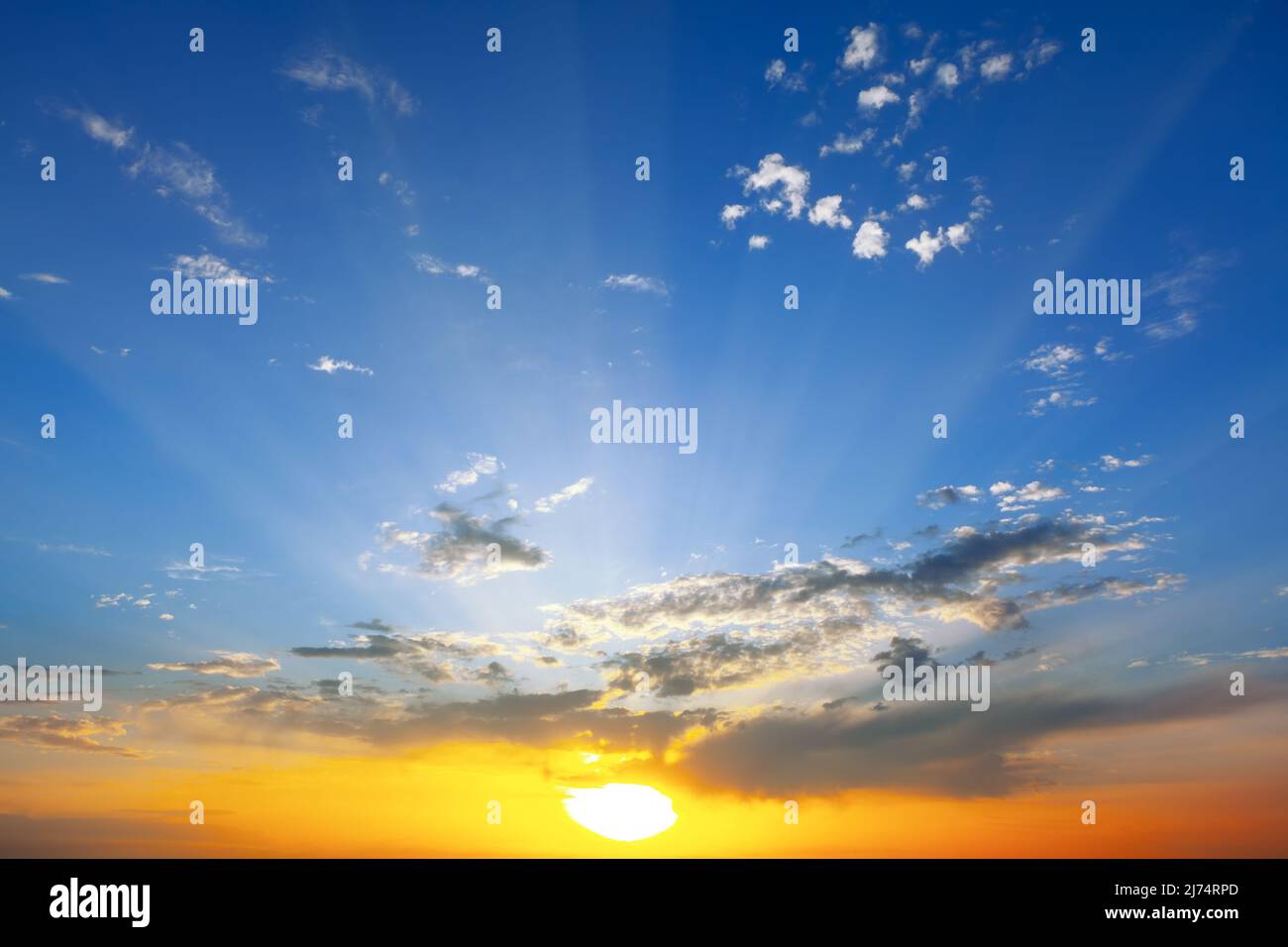 Evening sky with rays . Awesome twilight sky Stock Photo - Alamy