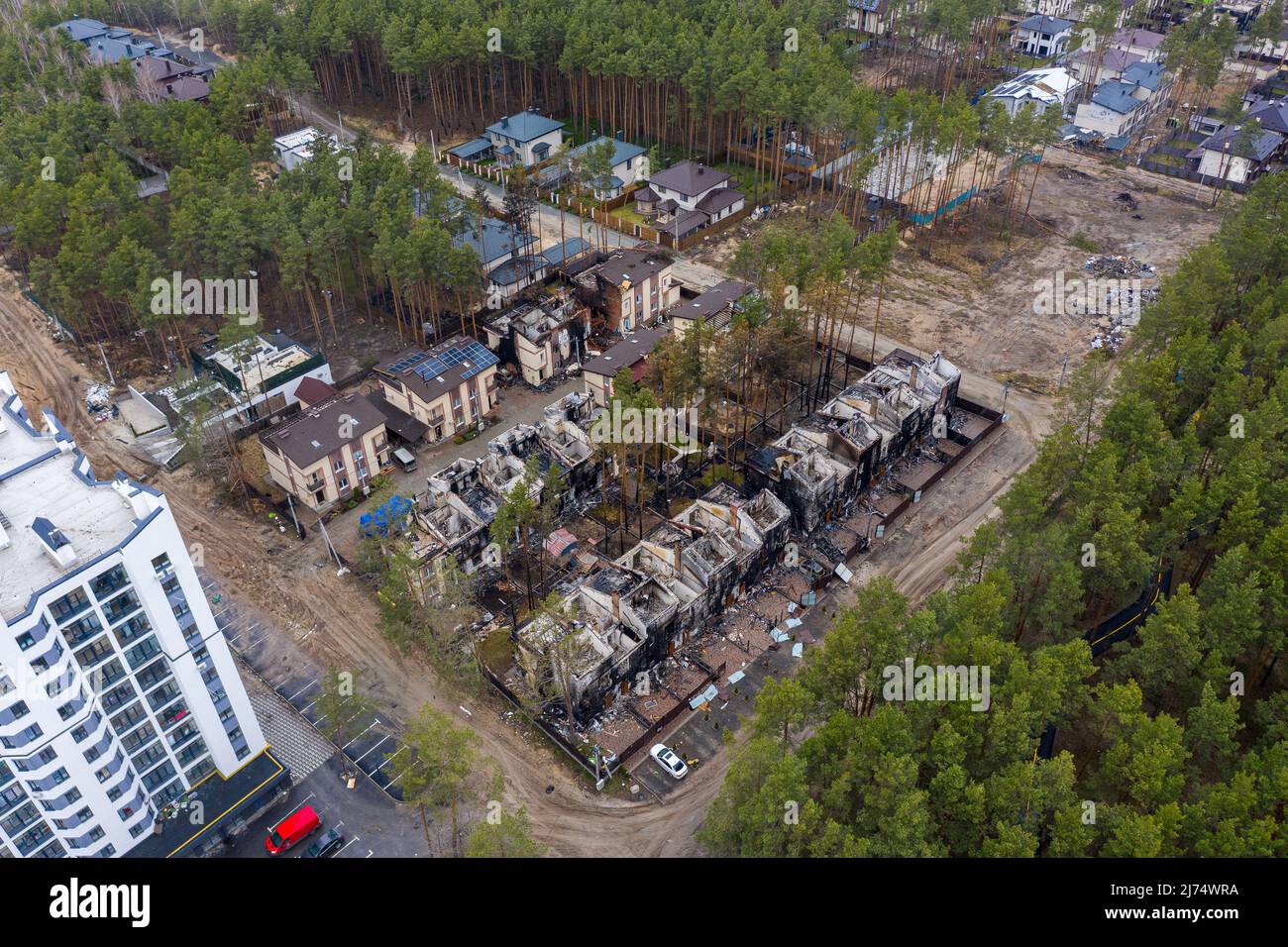 The aerial view of the destroyed and burnt buildings. The buildings ...