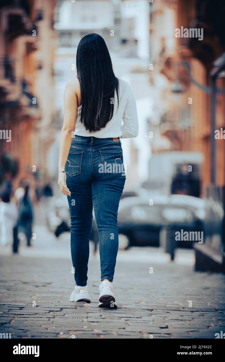 Indian women walking away hi-res stock photography and images - Alamy