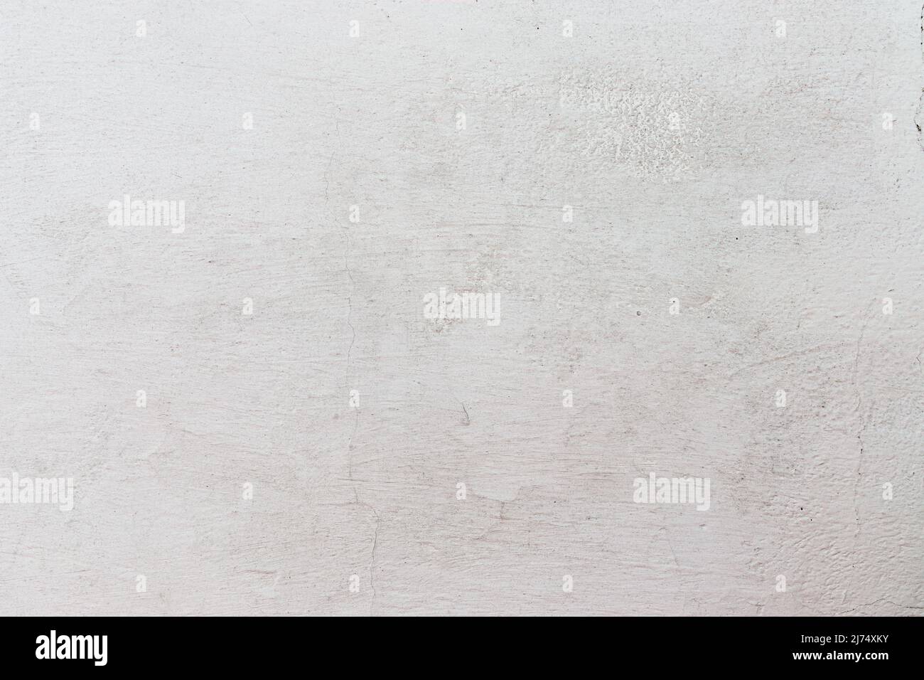 Plaster on a gray wall covered with chalk. The texture of the ...