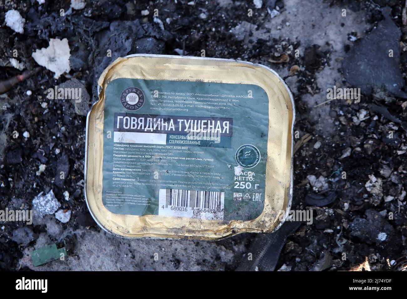 KYIV REGION, UKRAINE - MAY 5, 2022 - A can of Russian stewed meat is ...