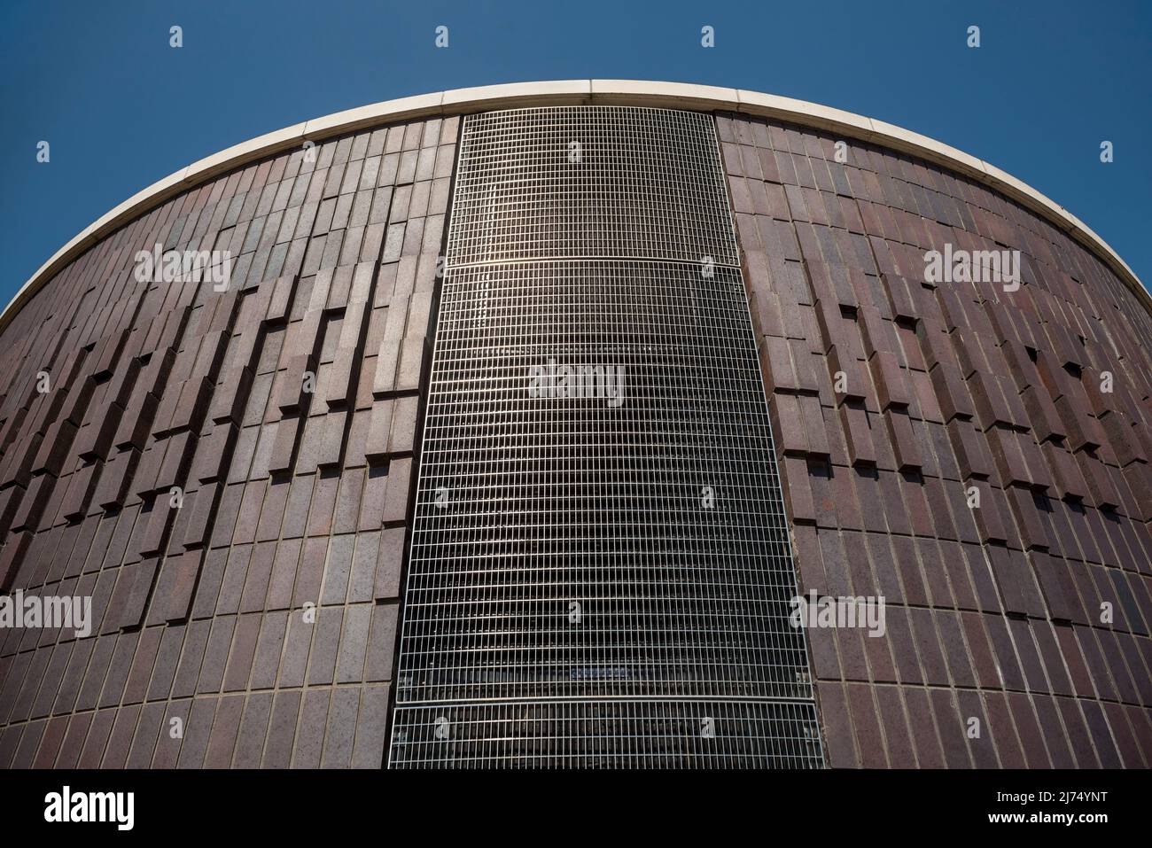Brick / blockwork laid in stepped relief vertical lines as decoration ...