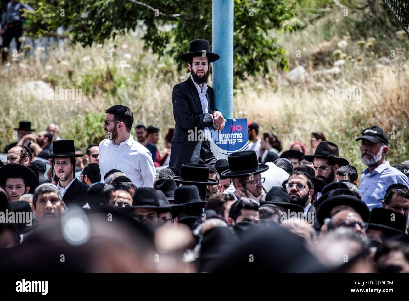 06 May 2022, Israel, Elad: Mourners attend the funeral of Yonatan ...