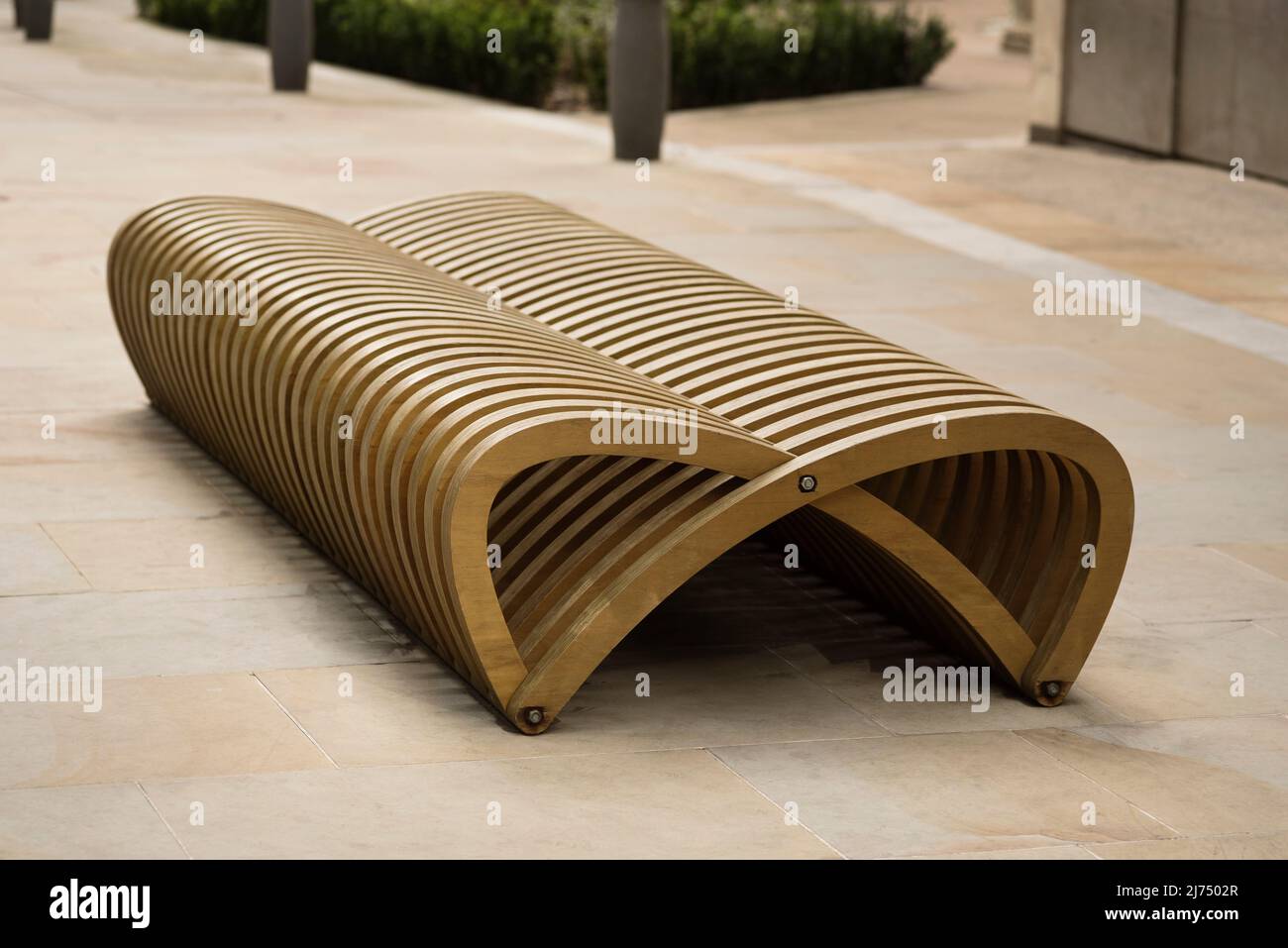 Modern design bench engineered from plywood Stock Photo - Alamy
