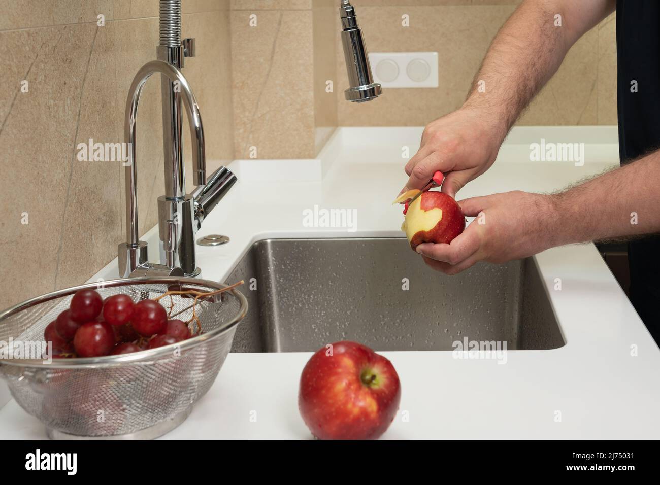 Chef peeling cutting apple hi-res stock photography and images - Alamy