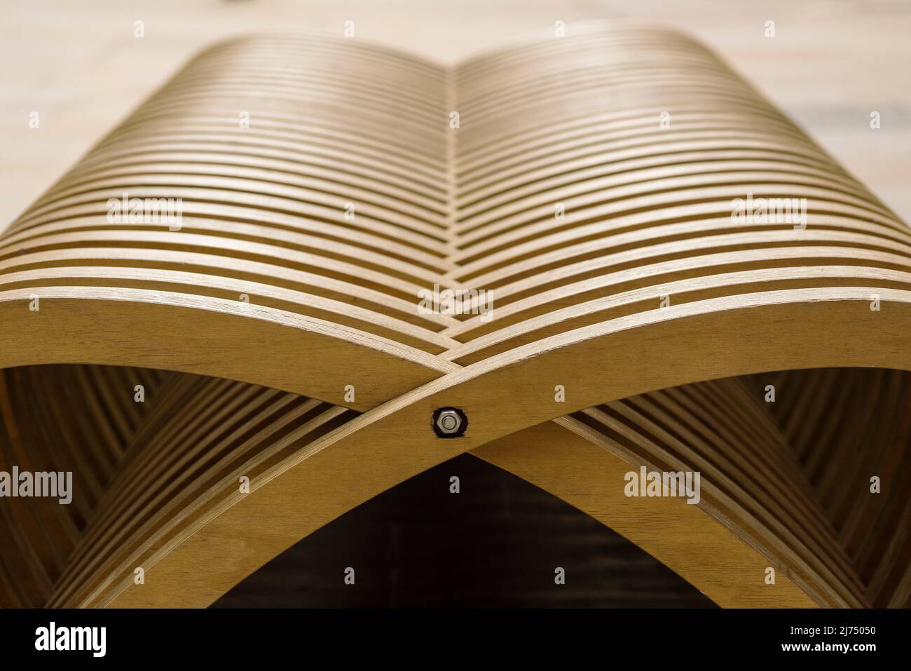 Modern design bench engineered from plywood Stock Photo - Alamy