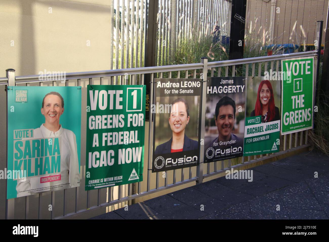 Political signs on a fence ahead of the federal election in St Peters ...