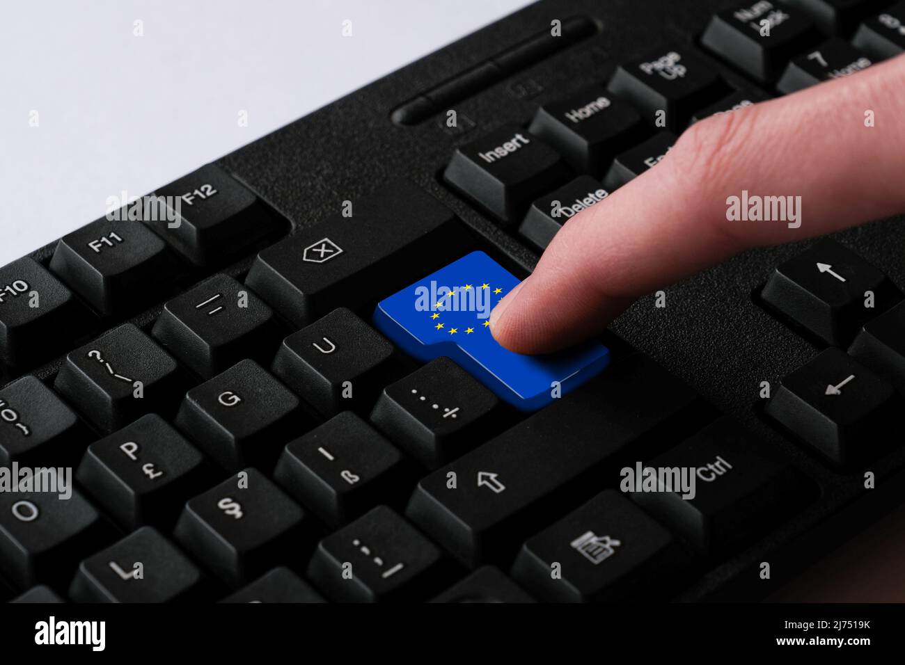 Pressing enter button with European Union flag, represents a cyber ...